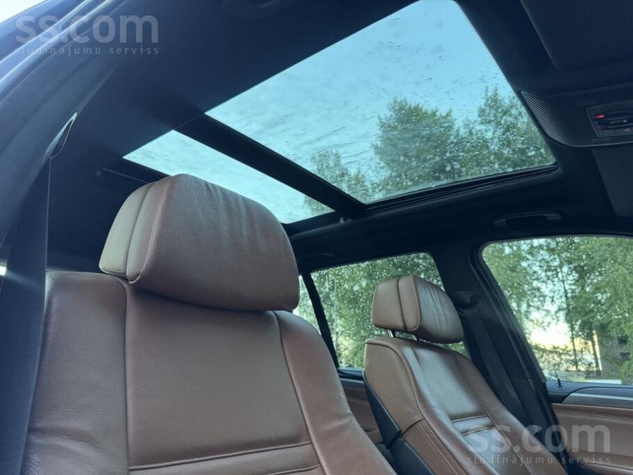 Black BMW X5 2008 in Cesis, with an engine capacity of 3.00 L and mileage of 296 thousand km for 8490 €, photo 22 on AUTOMOTO.COM.LV