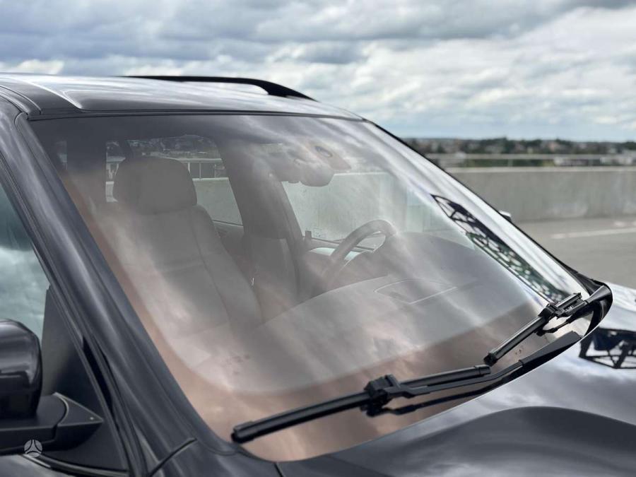 Black BMW X5 2008 in Vilnius, with an engine capacity of 2.99 L and mileage of 344 thousand km for 5899 €, photo 11 on AUTOMOTO.COM.LV