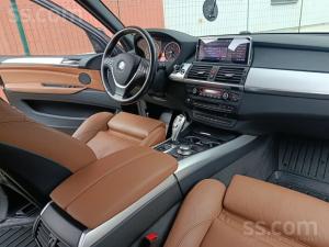Black BMW X5 2008 in Riga, with an engine capacity of 3.00 L and mileage of 380 thousand km for 8999 €, photo 10 on AUTOMOTO.COM.LV