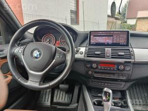 Black BMW X5 2008 in Riga, with an engine capacity of 3.00 L and mileage of 380 thousand km for 8999 €, photo 13 on AUTOMOTO.COM.LV