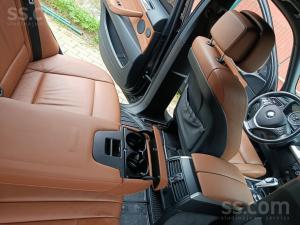 Black BMW X5 2008 in Riga, with an engine capacity of 3.00 L and mileage of 380 thousand km for 8999 €, photo 18 on AUTOMOTO.COM.LV