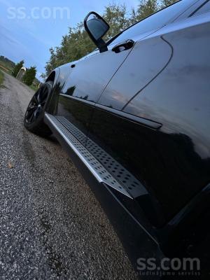 Black BMW X5 2008 in Rezekne, with an engine capacity of 3.00 L and mileage of 396 thousand km for 9300 €, photo 8 on AUTOMOTO.COM.LV
