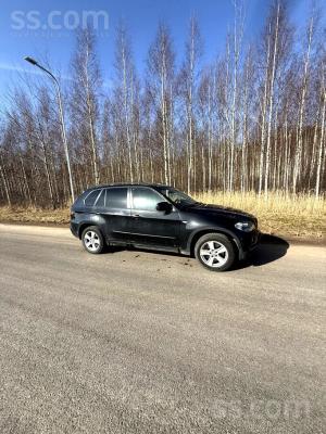 Black BMW X5 2008 in Riga, with an engine capacity of 3.00 L and mileage of 310 thousand km for 6300 €, photo 3 on AUTOMOTO.COM.LV