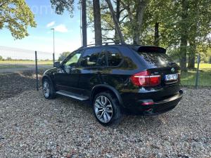 Black BMW X5 2008 in Cesis, with an engine capacity of 3.00 L and mileage of 0 thousand km for 8700 €, photo 4 on AUTOMOTO.COM.LV