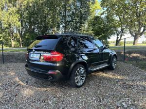Black BMW X5 2008 in Cesis, with an engine capacity of 3.00 L and mileage of 0 thousand km for 8700 €, photo 5 on AUTOMOTO.COM.LV