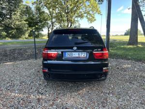Black BMW X5 2008 in Cesis, with an engine capacity of 3.00 L and mileage of 0 thousand km for 8700 €, photo 6 on AUTOMOTO.COM.LV