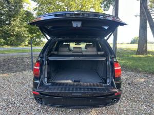 Black BMW X5 2008 in Cesis, with an engine capacity of 3.00 L and mileage of 0 thousand km for 8700 €, photo 12 on AUTOMOTO.COM.LV