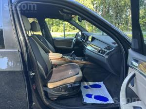 Black BMW X5 2008 in Cesis, with an engine capacity of 3.00 L and mileage of 0 thousand km for 8700 €, photo 15 on AUTOMOTO.COM.LV