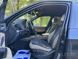 Black BMW X5 2008 in Cesis, with an engine capacity of 3.00 L and mileage of 0 thousand km for 8700 €, photo 16 on AUTOMOTO.COM.LV