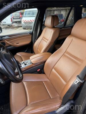 Black BMW X5 2008 in Riga, with an engine capacity of 3.00 L and mileage of 328 thousand km for 6200 €, photo 11 on AUTOMOTO.COM.LV