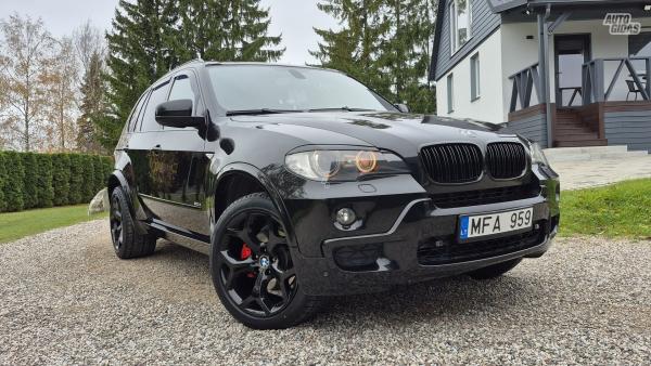 Black BMW X5 2008 in Utena, with an engine capacity of 3.00 L and mileage of 392 thousand km for 9390 €, photo 6 on AUTOMOTO.COM.LV