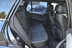 Black BMW X5 2009 in Riga, with an engine capacity of 3.00 L and mileage of 0 thousand km for 9950 €, photo 10 on AUTOMOTO.COM.LV