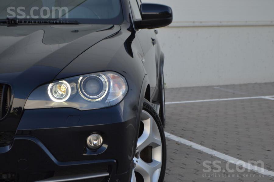 Black BMW X5 2009 in Riga, with an engine capacity of 3.00 L and mileage of 0 thousand km for 9950 €, photo 30 on AUTOMOTO.COM.LV