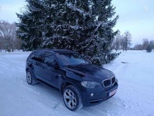 Black BMW X5 2009 in Panevezys, with an engine capacity of 0.00 L and mileage of 337 thousand km for 6800 €, photo 6 on AUTOMOTO.COM.LV