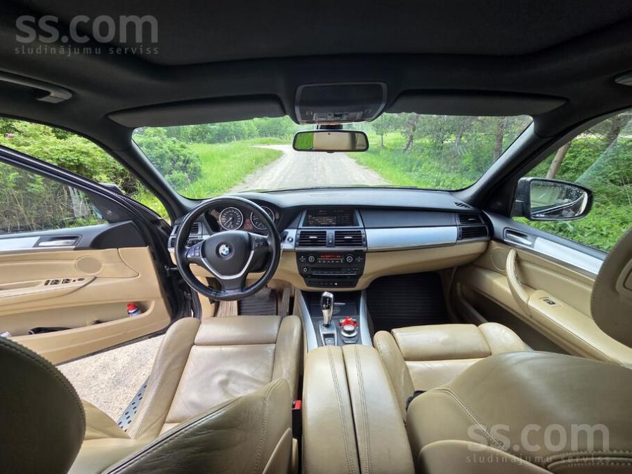 Black BMW X5 2009 in Madona, with an engine capacity of 3.00 L and mileage of 289 thousand km for 8250 €, photo 12 on AUTOMOTO.COM.LV