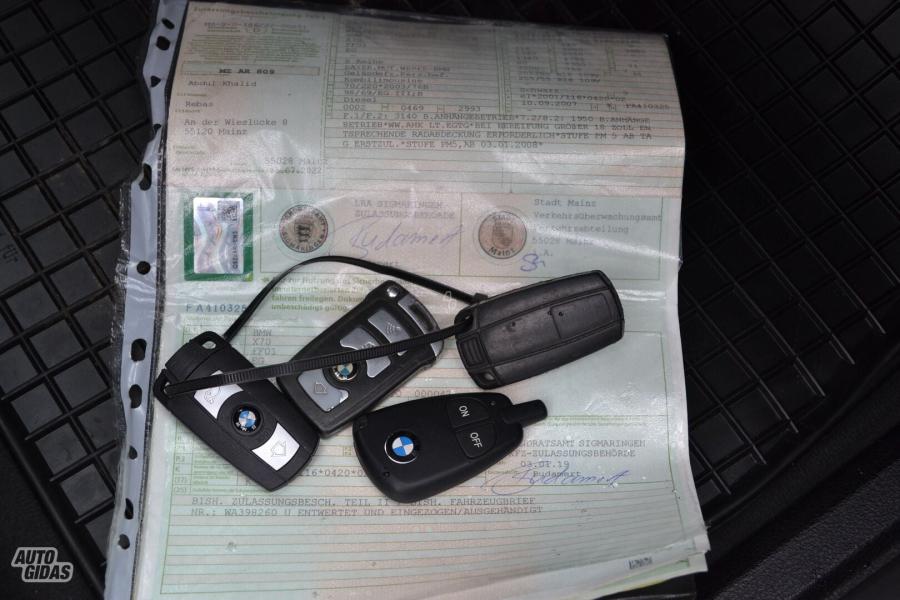 Black BMW X5 2009 in Vilnius, with an engine capacity of 3.00 L and mileage of 211 thousand km for 10200 €, photo 20 on AUTOMOTO.COM.LV