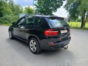 Black BMW X5 2009 in Ogre, with an engine capacity of 3.00 L and mileage of 0 thousand km for 5500 €, photo 4 on AUTOMOTO.COM.LV