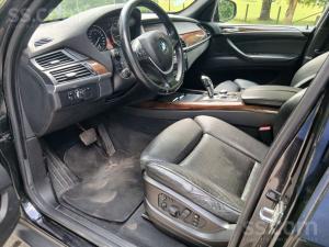 Black BMW X5 2009 in Ogre, with an engine capacity of 3.00 L and mileage of 0 thousand km for 5500 €, photo 11 on AUTOMOTO.COM.LV