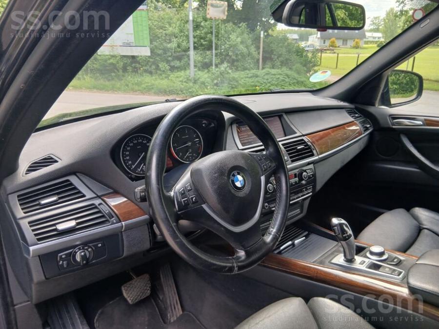 Black BMW X5 2009 in Ogre, with an engine capacity of 3.00 L and mileage of 0 thousand km for 5500 €, photo 12 on AUTOMOTO.COM.LV