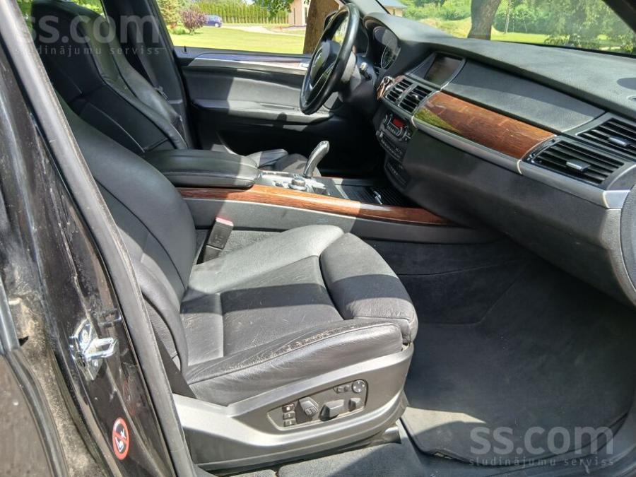 Black BMW X5 2009 in Ogre, with an engine capacity of 3.00 L and mileage of 0 thousand km for 5500 €, photo 15 on AUTOMOTO.COM.LV