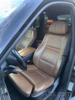 Melns BMW X5 2009 Valmiera, ar dzinēja tilpumu 3.00 L un nobraukumu 281 tūkst. km par 12000 €, foto 7 vietnē AUTOMOTO.COM.LV