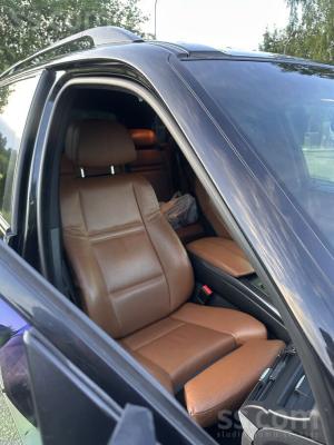 Melns BMW X5 2009 Valmiera, ar dzinēja tilpumu 3.00 L un nobraukumu 281 tūkst. km par 12000 €, foto 10 vietnē AUTOMOTO.COM.LV