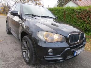 Black BMW X5 2009 in Riga, with an engine capacity of 3.00 L and mileage of 321 thousand km for 8990 €, photo 5 on AUTOMOTO.COM.LV