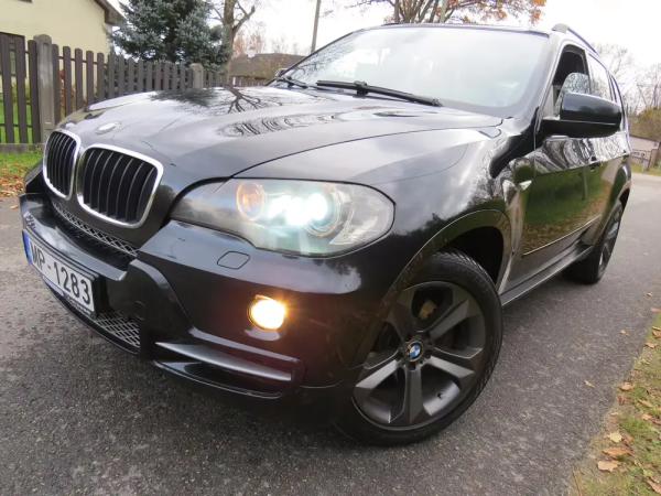 Black BMW X5 2009 in Riga, with an engine capacity of 3.00 L and mileage of 321 thousand km for 8990 €, photo 5 on AUTOMOTO.COM.LV