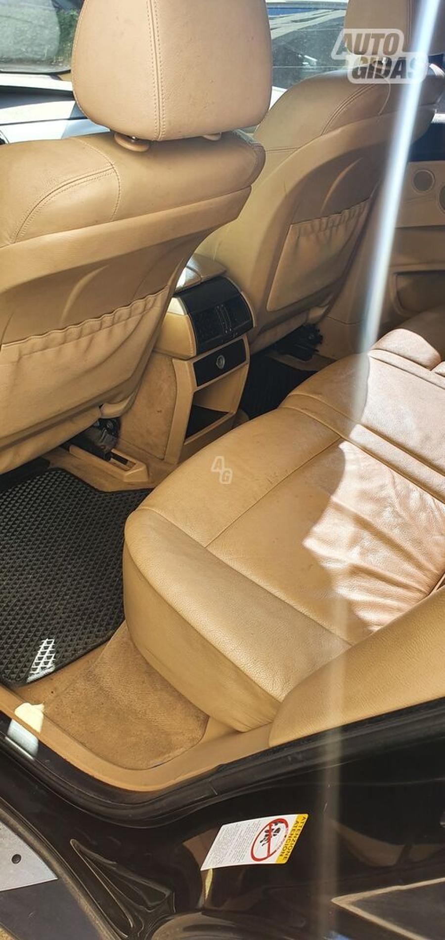 Black BMW X5 2009 in Vilnius, with an engine capacity of 3.00 L and mileage of 360 thousand km for 8500 €, photo 11 on AUTOMOTO.COM.LV