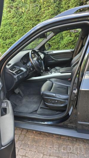 Black BMW X5 2009 in Riga, with an engine capacity of 3.00 L and mileage of 190 thousand km for 12900 €, photo 6 on AUTOMOTO.COM.LV