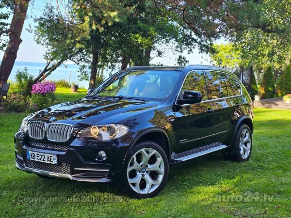 Black BMW X5 2009 in Tallinn, with an engine capacity of 3.50 L and mileage of 331 thousand km for 8998 €, photo 4 on AUTOMOTO.COM.LV