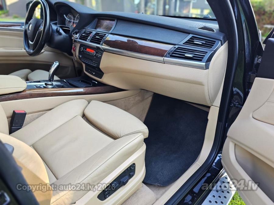 Melns BMW X5 2009 Tallina, ar dzinēja tilpumu 3.50 L un nobraukumu 331 tūkst. km par 8998 €, foto 14 vietnē AUTOMOTO.COM.LV