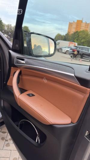 Black BMW X5 2009 in Kaunas, with an engine capacity of 3.00 L and mileage of 354 thousand km for 7500 €, photo 18 on AUTOMOTO.COM.LV