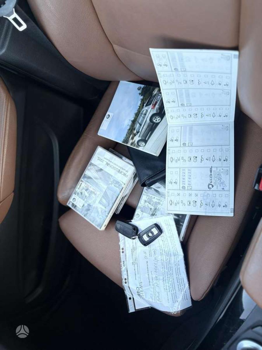 Black BMW X5 2009 in Vilnius, with an engine capacity of 3.00 L and mileage of 285 thousand km for 8300 €, photo 21 on AUTOMOTO.COM.LV