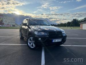 Melns BMW X5 2009 Ogre, ar dzinēja tilpumu 3.00 L un nobraukumu 374 tūkst. km par 8499 €, foto  vietnē AUTOMOTO.COM.LV