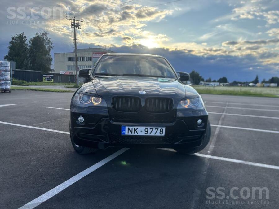 Melns BMW X5 2009 Ogre, ar dzinēja tilpumu 3.00 L un nobraukumu 374 tūkst. km par 8499 €, foto 4 vietnē AUTOMOTO.COM.LV