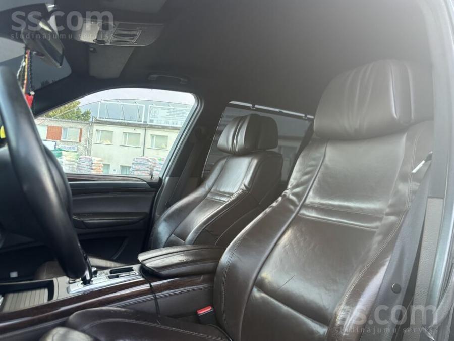 Melns BMW X5 2009 Ogre, ar dzinēja tilpumu 3.00 L un nobraukumu 374 tūkst. km par 8499 €, foto 20 vietnē AUTOMOTO.COM.LV