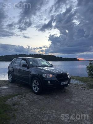 Melns BMW X5 2009 Ogre, ar dzinēja tilpumu 3.00 L un nobraukumu 374 tūkst. km par 8499 €, foto 35 vietnē AUTOMOTO.COM.LV
