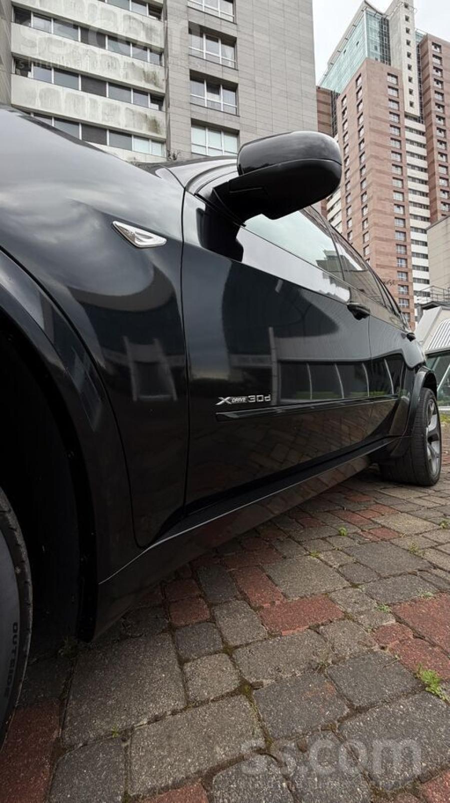 Black BMW X5 2009 in Riga, with an engine capacity of 3.00 L and mileage of 344 thousand km for 9750 €, photo 10 on AUTOMOTO.COM.LV