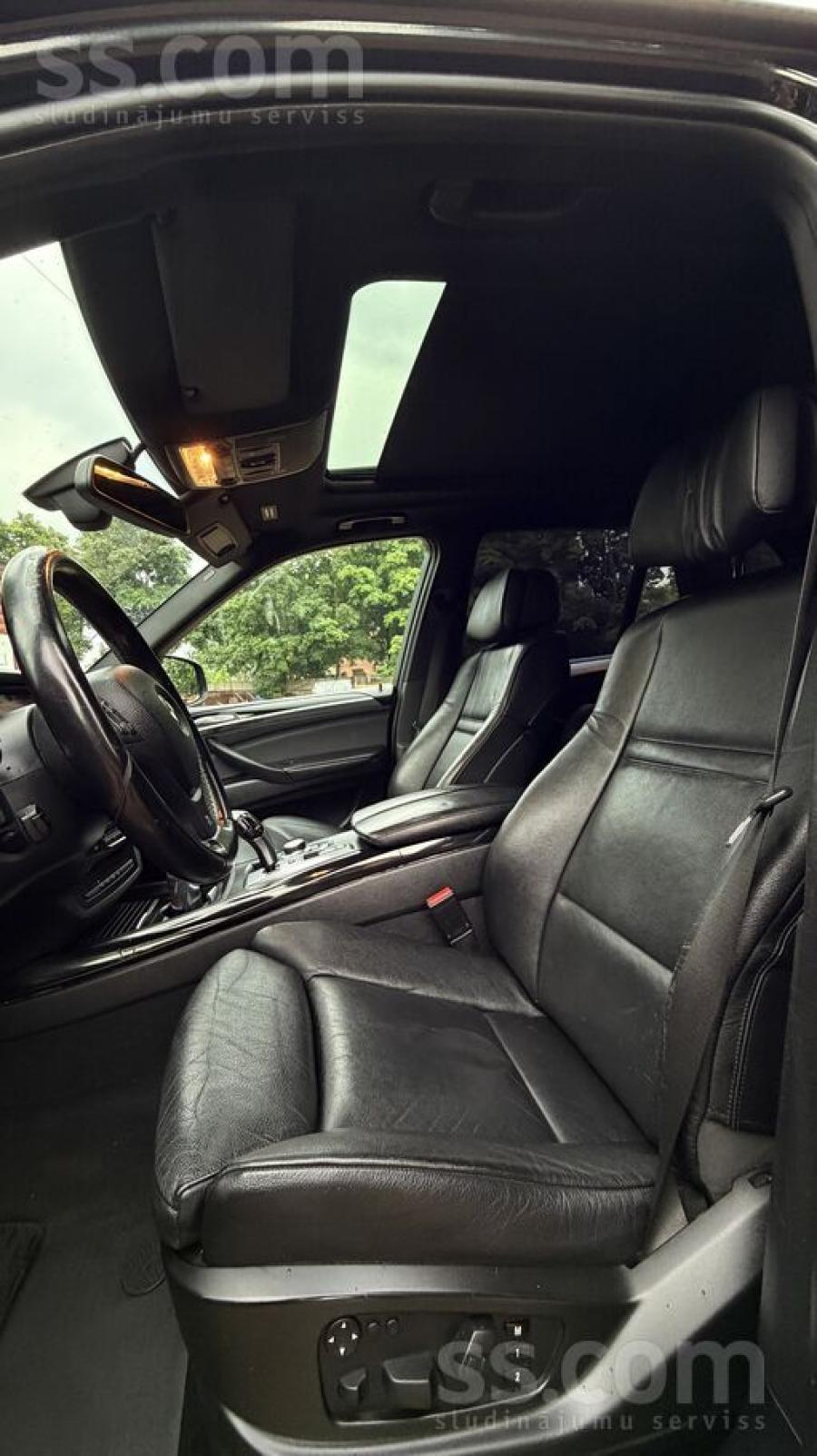 Black BMW X5 2009 in Riga, with an engine capacity of 3.00 L and mileage of 344 thousand km for 9750 €, photo 11 on AUTOMOTO.COM.LV
