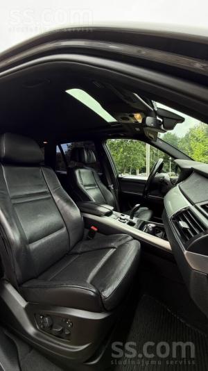 Black BMW X5 2009 in Riga, with an engine capacity of 3.00 L and mileage of 344 thousand km for 9750 €, photo 14 on AUTOMOTO.COM.LV
