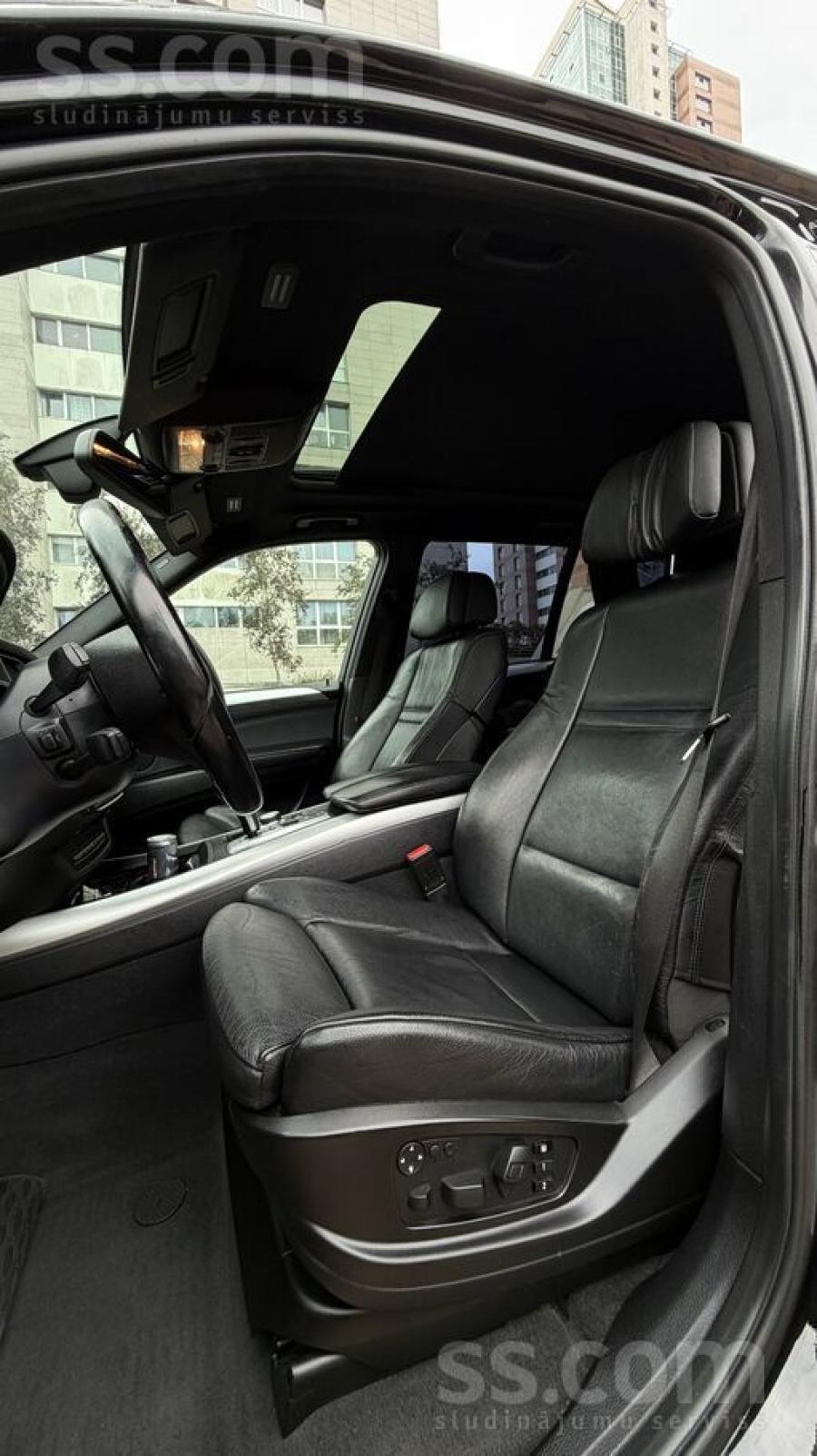 Black BMW X5 2009 in Riga, with an engine capacity of 3.00 L and mileage of 344 thousand km for 9750 €, photo 21 on AUTOMOTO.COM.LV