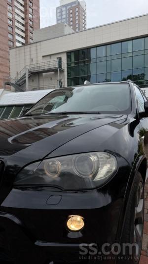 Black BMW X5 2009 in Riga, with an engine capacity of 3.00 L and mileage of 344 thousand km for 9750 €, photo 27 on AUTOMOTO.COM.LV
