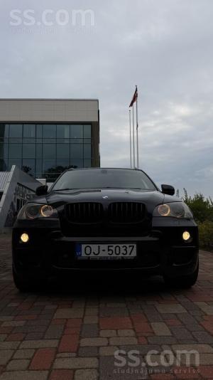 Black BMW X5 2009 in Riga, with an engine capacity of 3.00 L and mileage of 344 thousand km for 9750 €, photo 29 on AUTOMOTO.COM.LV