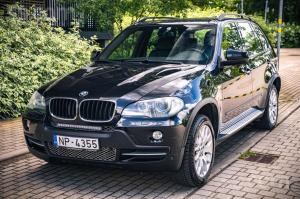 Black BMW X5 2009 in Riga, with an engine capacity of 3.00 L and mileage of 362 thousand km for 5990 €, photo  on AUTOMOTO.COM.LV