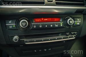 Black BMW X5 2009 in Riga, with an engine capacity of 3.00 L and mileage of 362 thousand km for 5990 €, photo 18 on AUTOMOTO.COM.LV