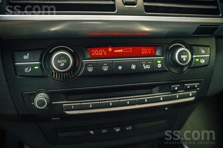 Black BMW X5 2009 in Riga, with an engine capacity of 3.00 L and mileage of 362 thousand km for 5990 €, photo 18 on AUTOMOTO.COM.LV