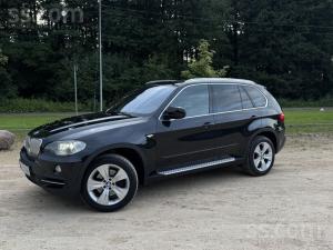 Black BMW X5 2009 in Riga, with an engine capacity of 3.00 L and mileage of 0 thousand km for 9700 €, photo 3 on AUTOMOTO.COM.LV