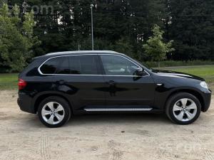 Black BMW X5 2009 in Riga, with an engine capacity of 3.00 L and mileage of 0 thousand km for 9700 €, photo 7 on AUTOMOTO.COM.LV