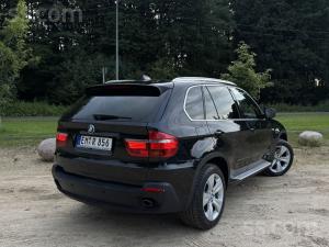 Black BMW X5 2009 in Riga, with an engine capacity of 3.00 L and mileage of 0 thousand km for 9700 €, photo 8 on AUTOMOTO.COM.LV